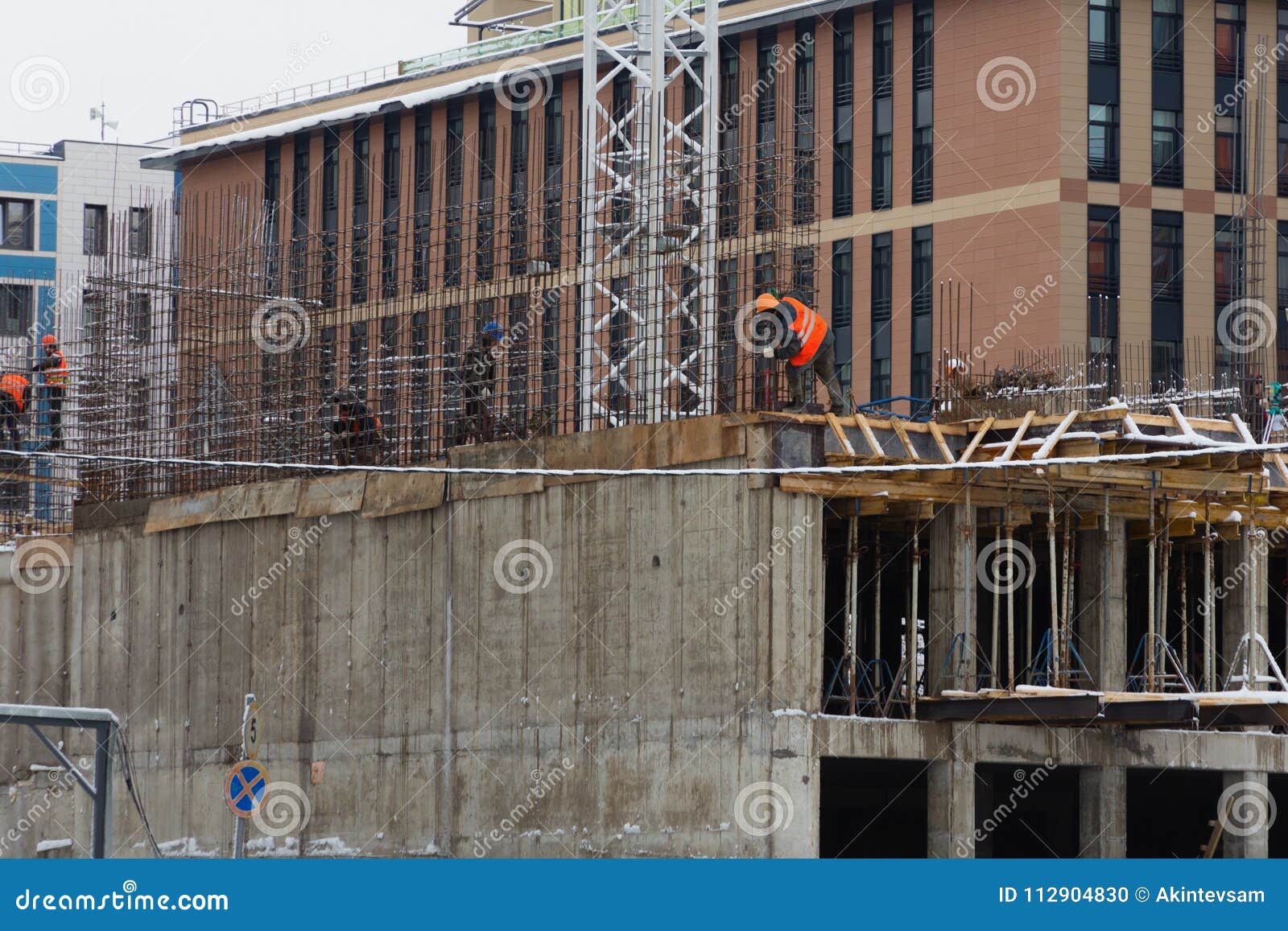 Building Construction. Installers are Working on the Construction of ...