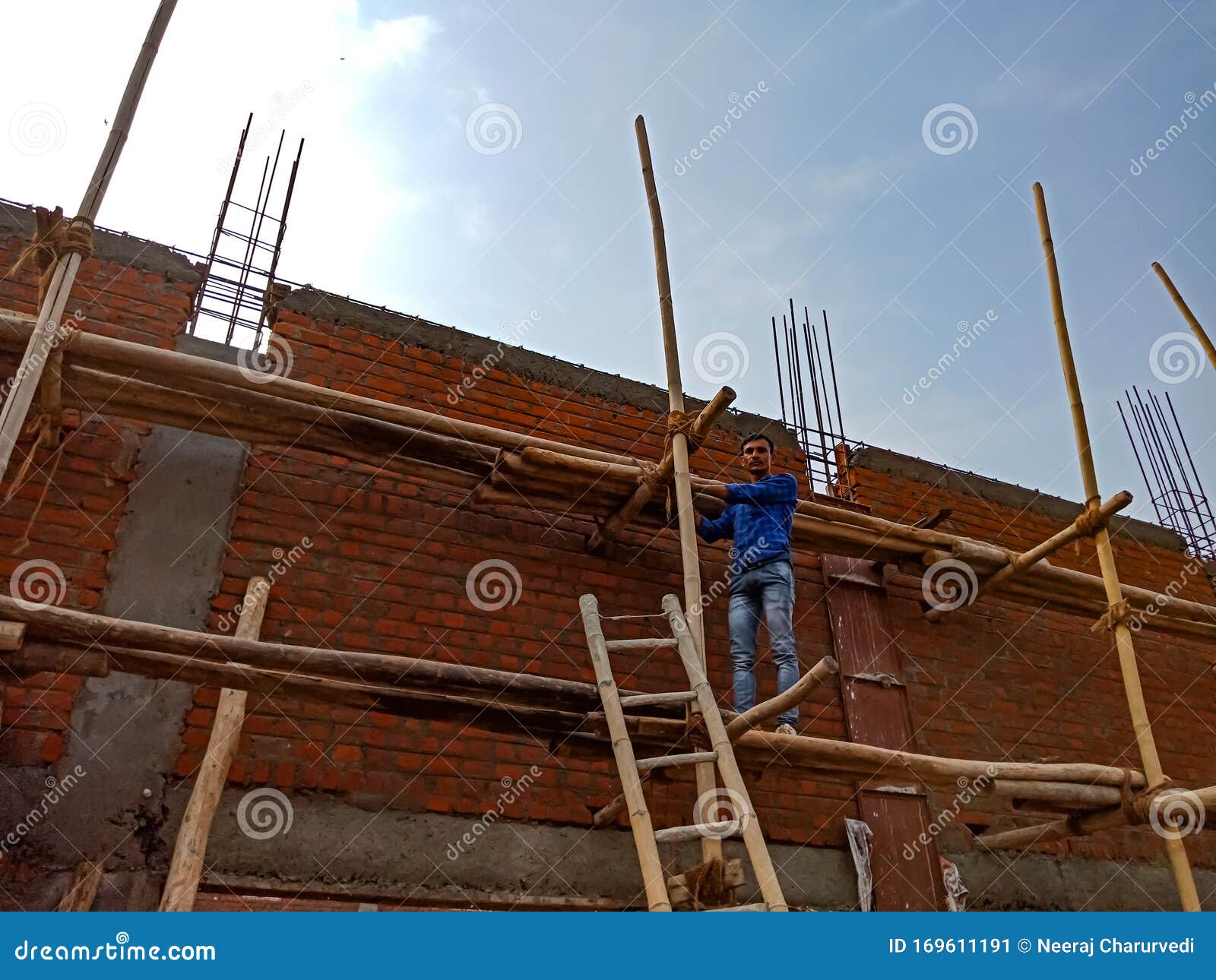 Building Construction Labour Making Wooden Structure for Wall Creation ...