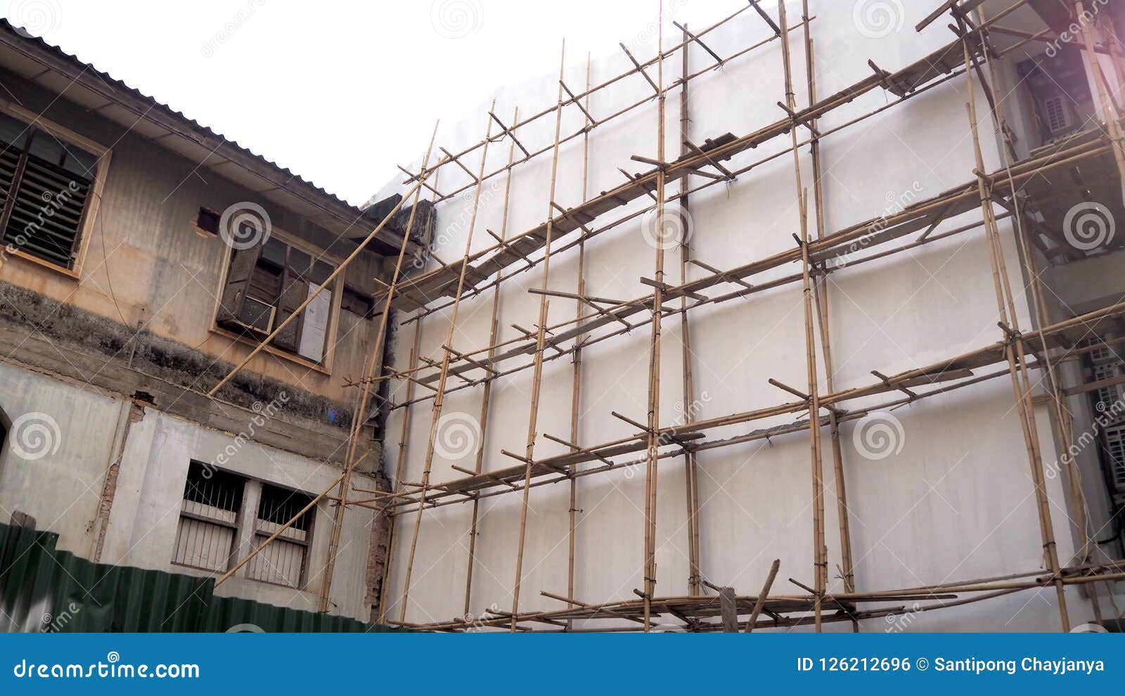 Building, Construction. Scaffolding at Construction with Wooden Bamboo ...