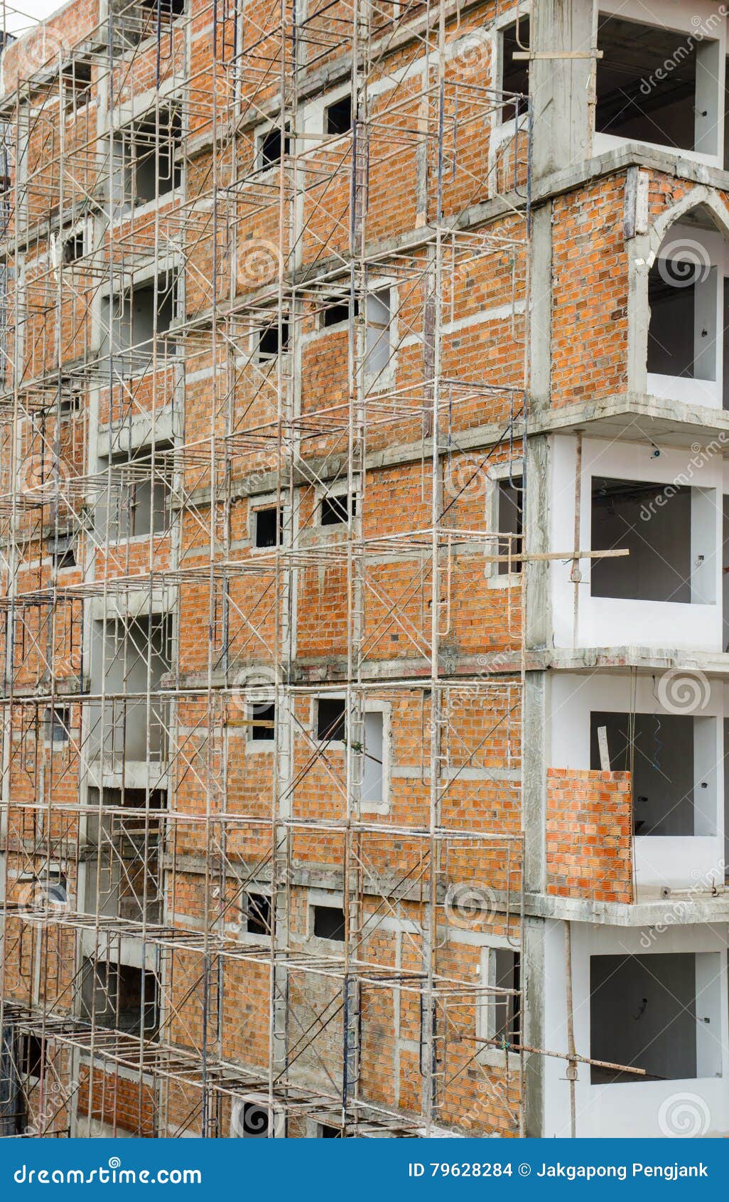 Building construction stock photo. Image of rise, scaffold - 79628284