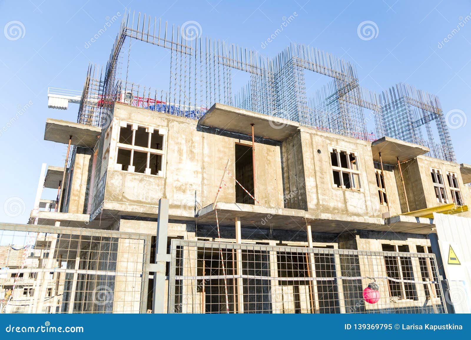 Building Construction Site Behind a Fence Against Blue Sky Stock Image ...