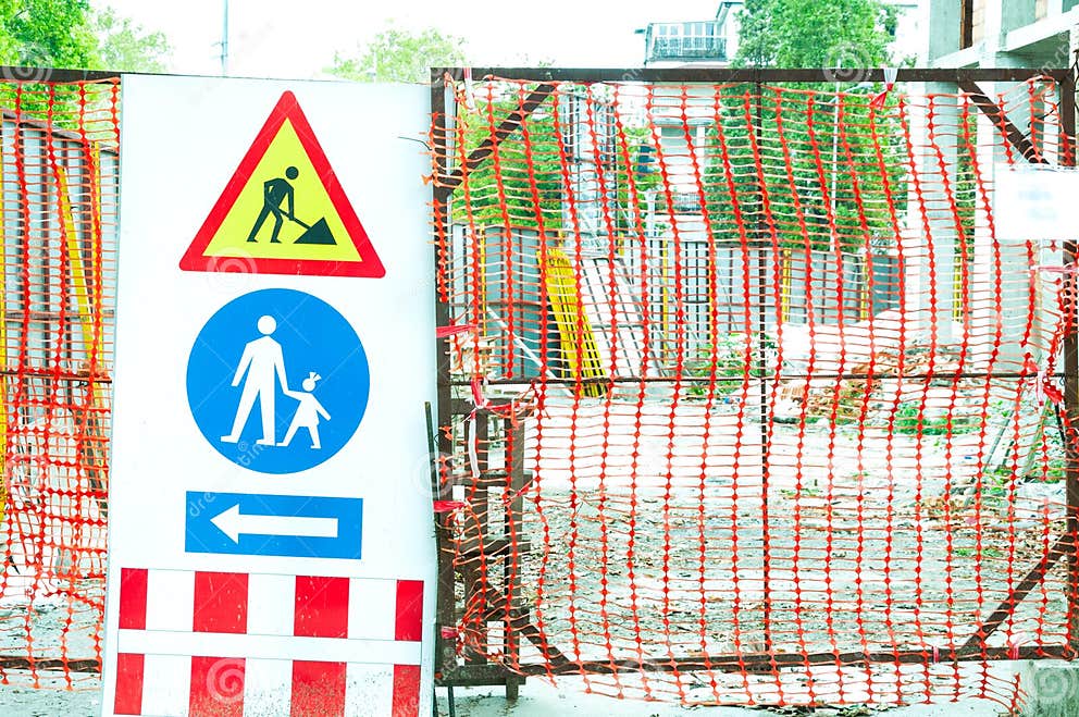 Building Construction Site Gate with Warning Signs for Caution. Stock ...