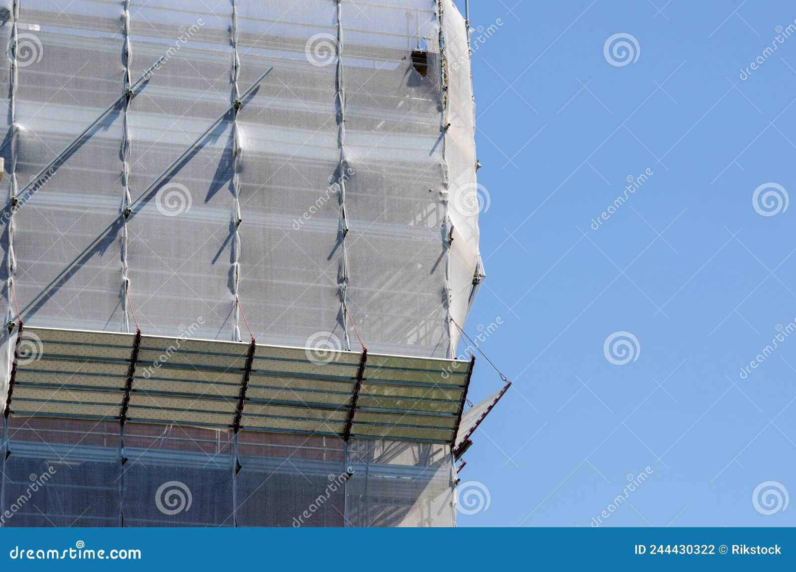 Scaffolding Structure with Fall Protection Sheet. Facade Structure for ...