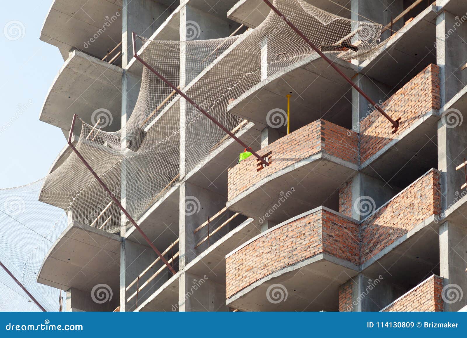 Building Construction Site Work Against Blue Sky. Construction of a New ...