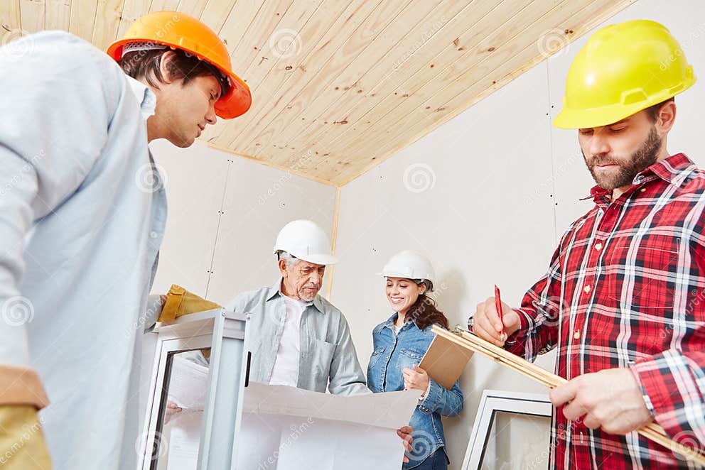 Building Construction Team Working on Floorplan Stock Image - Image of ...