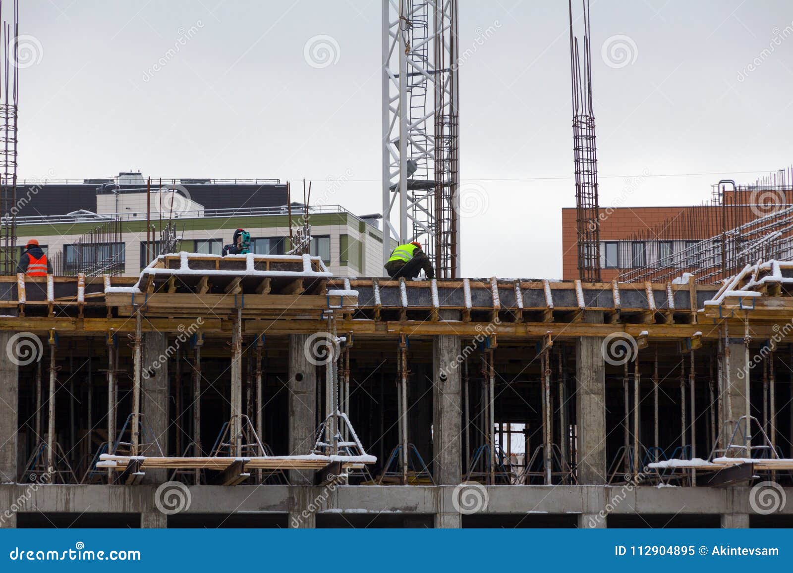 Building Construction. Installers are Working on the Construction of ...