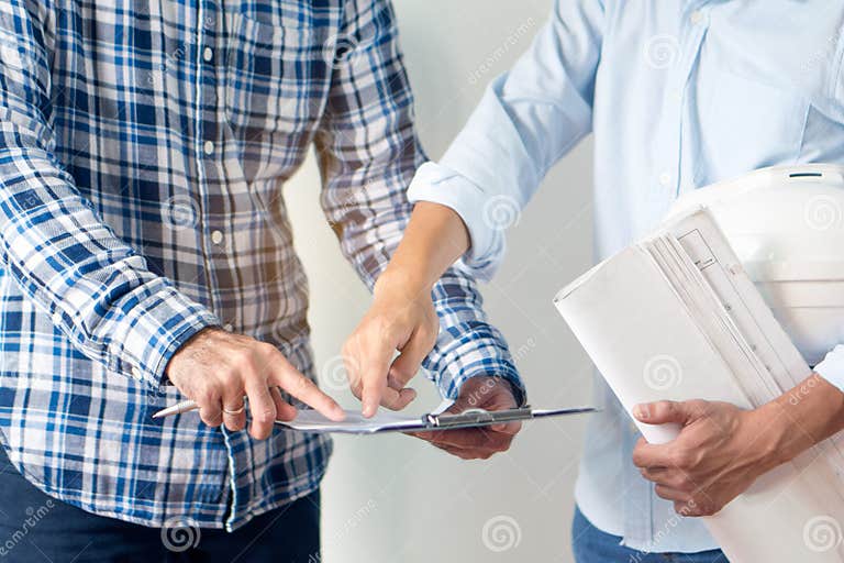 Building Consultant. Engineer and Contractor Discussing Material ...