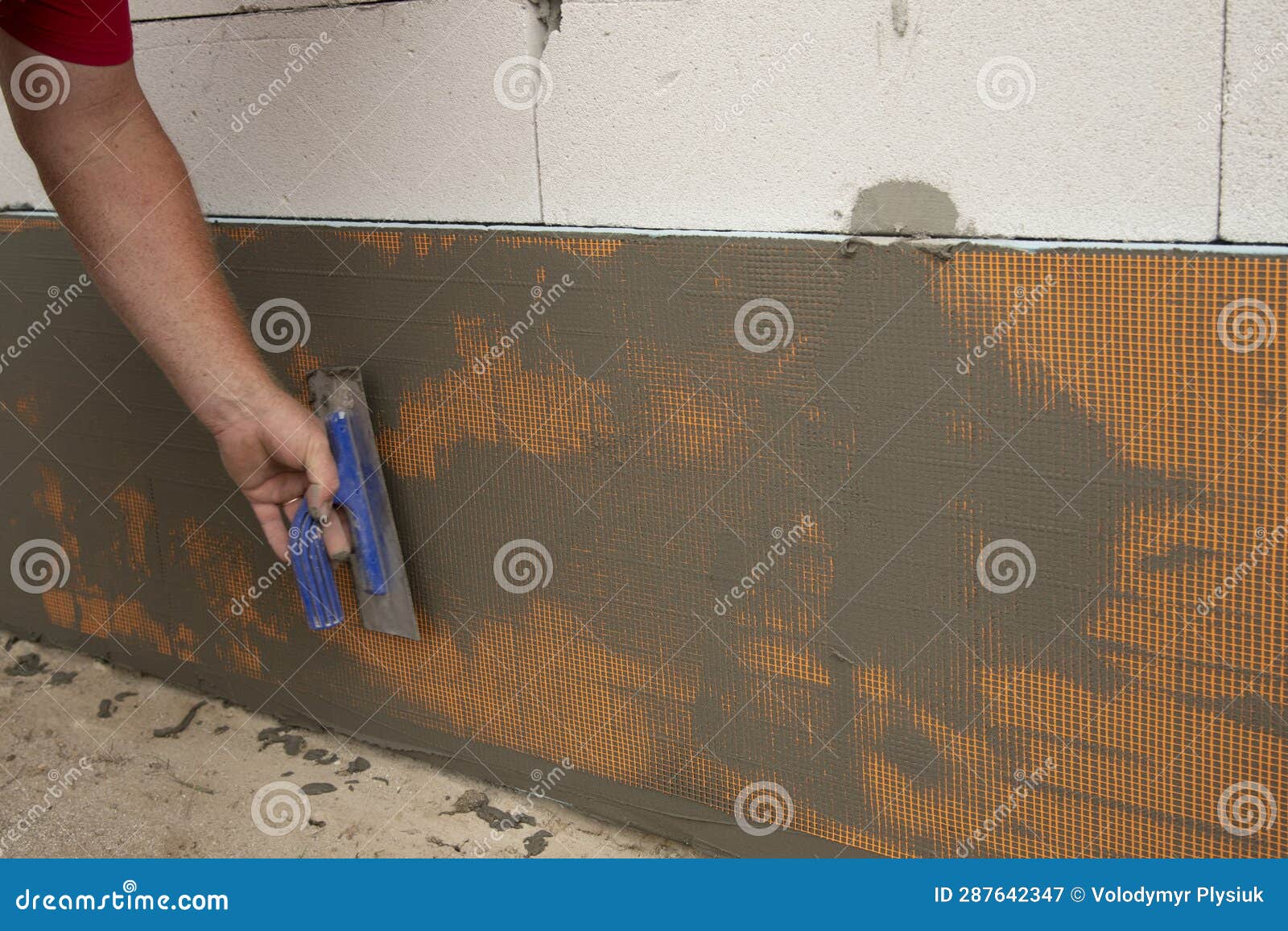 A Building Contractor is Installing a Reinforcing Mesh Stock Image ...