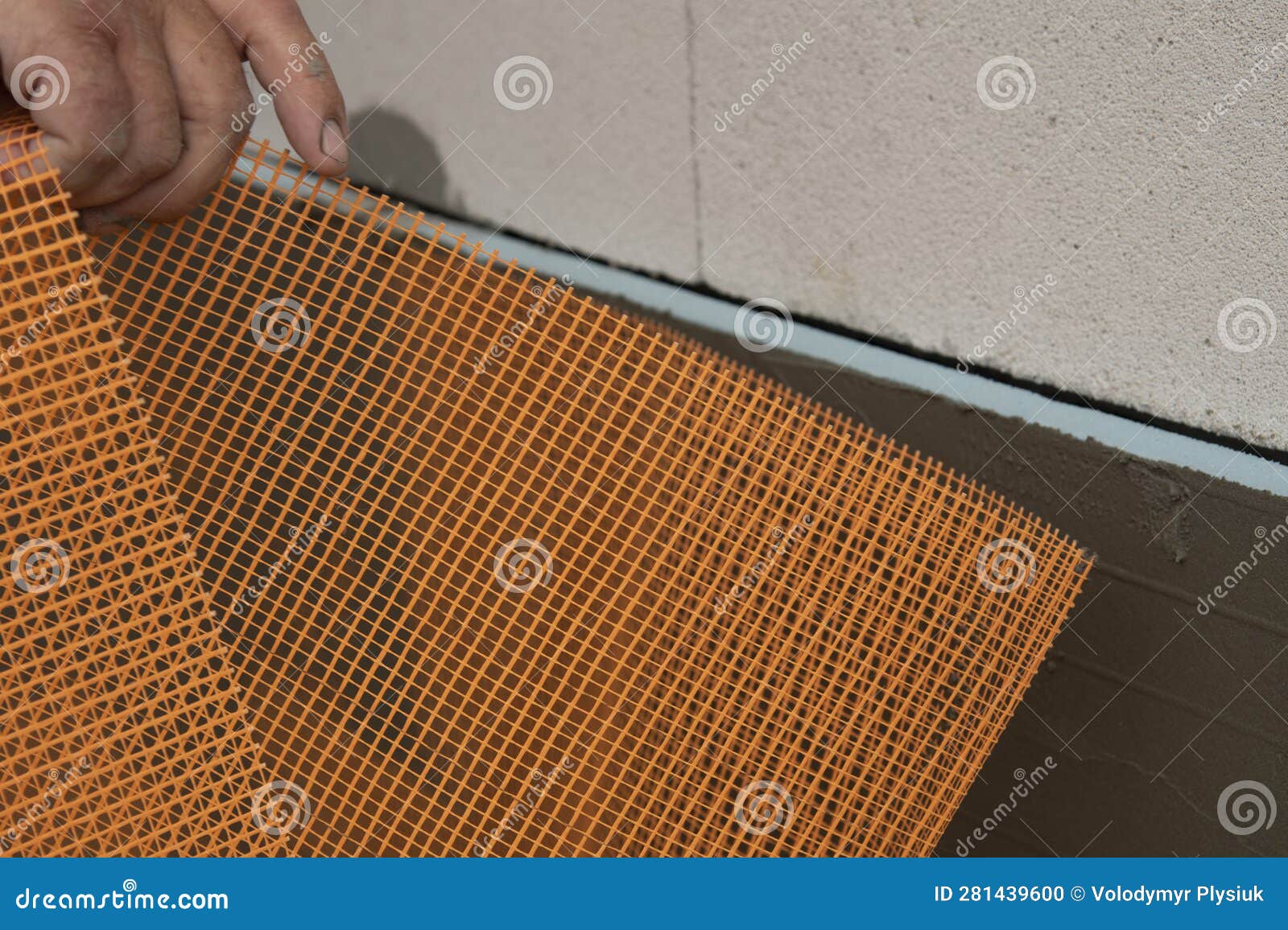 A Building Contractor is Installing a Reinforcing Mesh Stock Photo ...