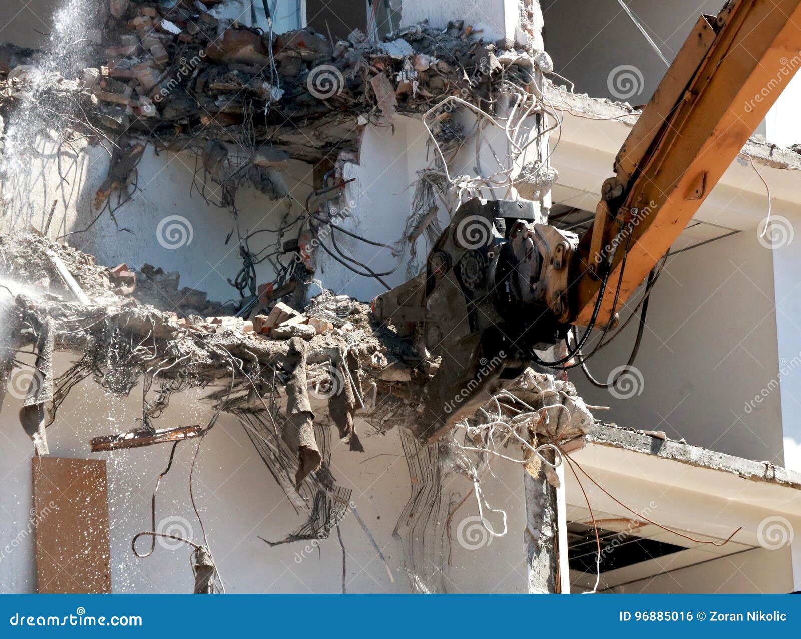 Building Demolition Machine Stock Photo - Image of horizontal, blue ...