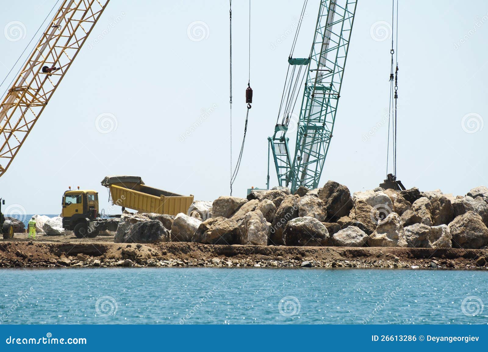 Building a Dike. Cranes and Excavator Put Stones Stock Photo - Image of ...