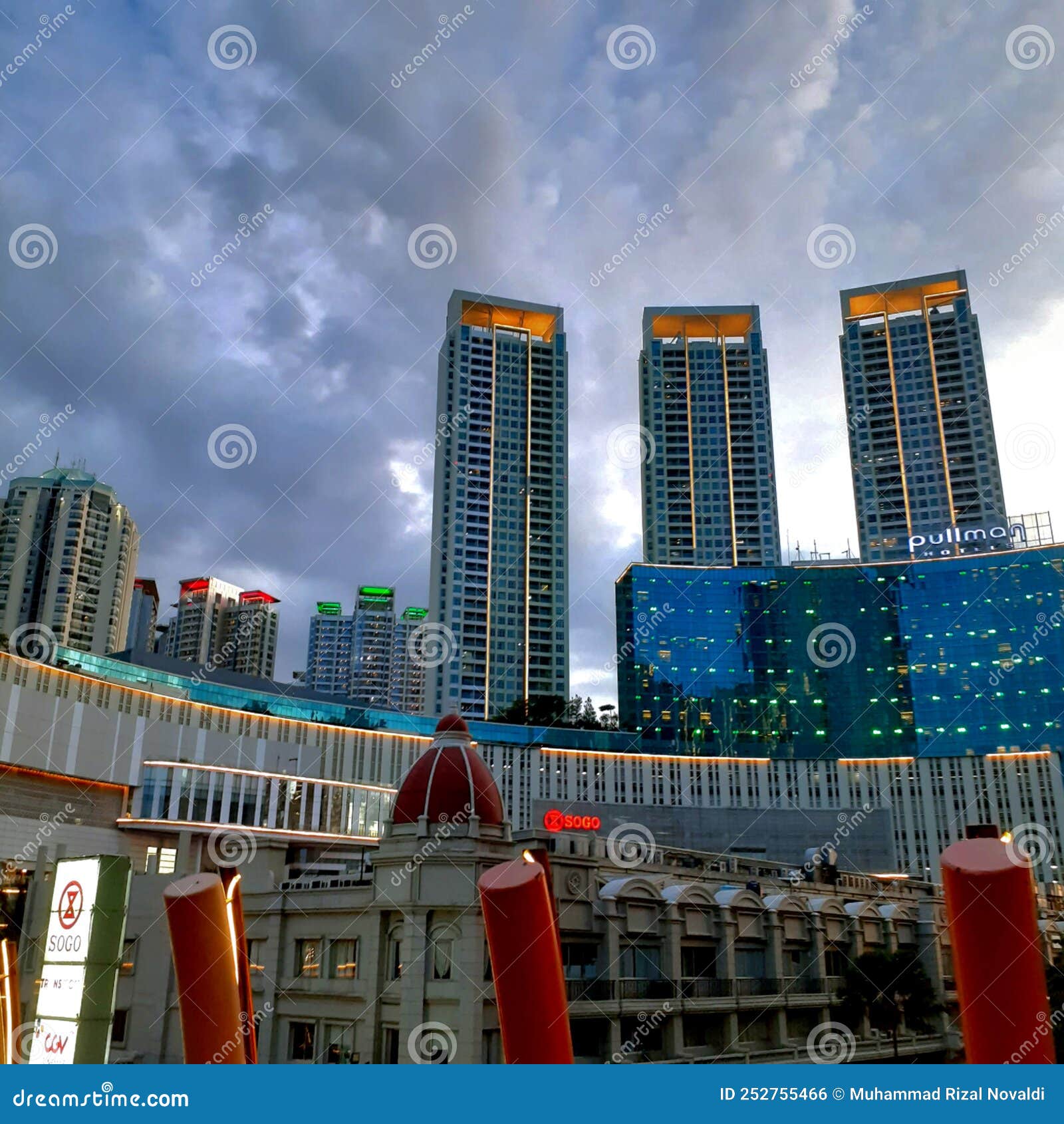 A Building with a Building on Each Side Stock Photo - Image of side ...