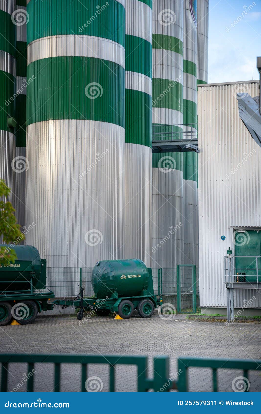 The Building of the Eichbaum Brewery with Silos and Flags Editorial ...