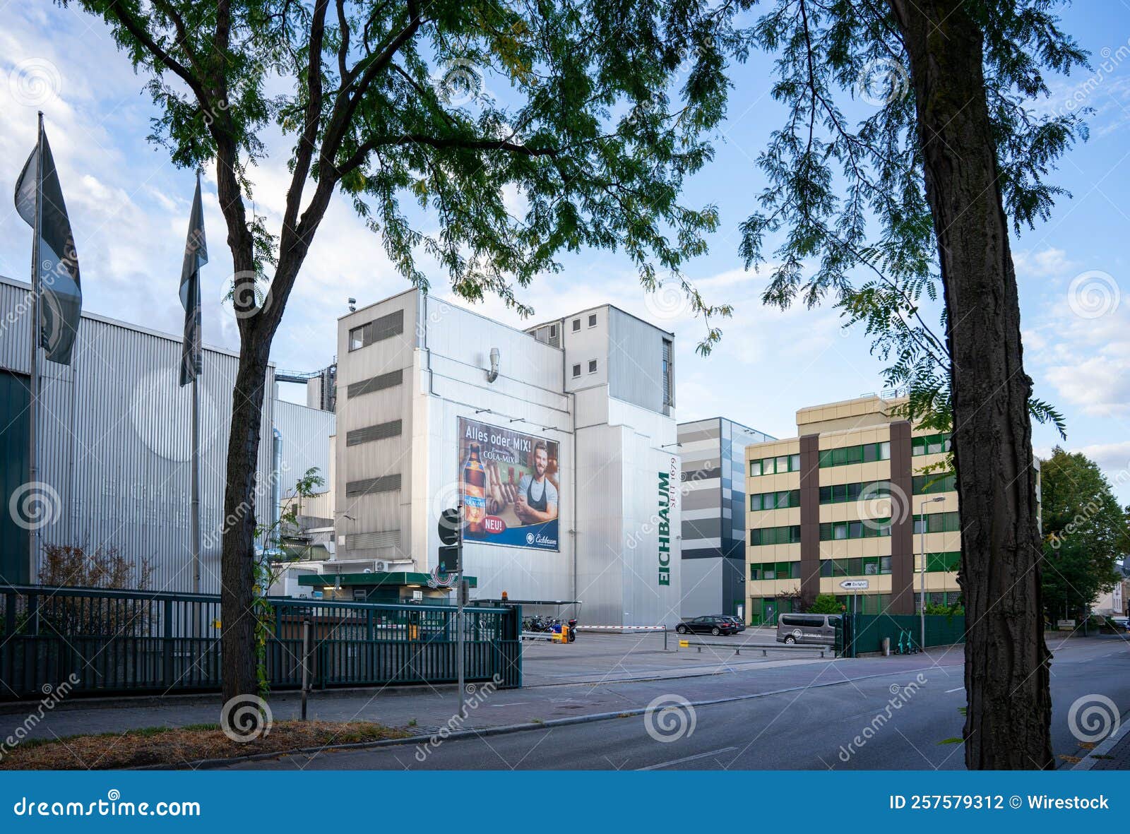 The Building of the Eichbaum Brewery with Silos and Flags Editorial ...