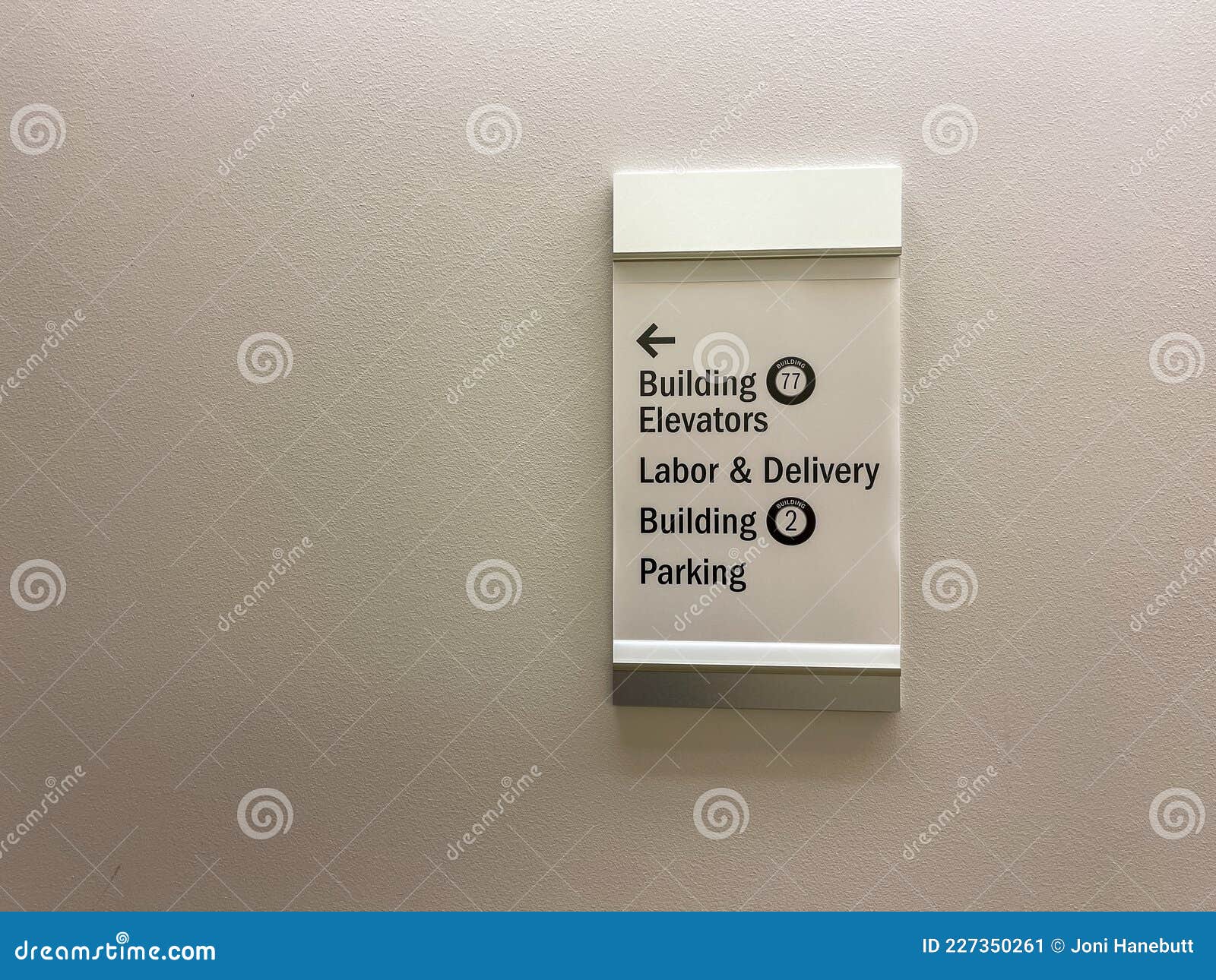The Building Elevator, Labor and Delivery and Parking Sign for a ...