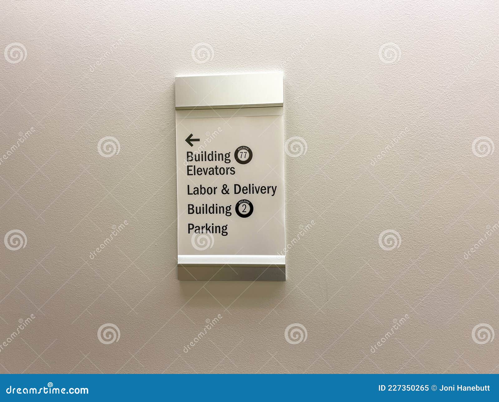 The Building Elevator, Labor and Delivery and Parking Sign for a ...