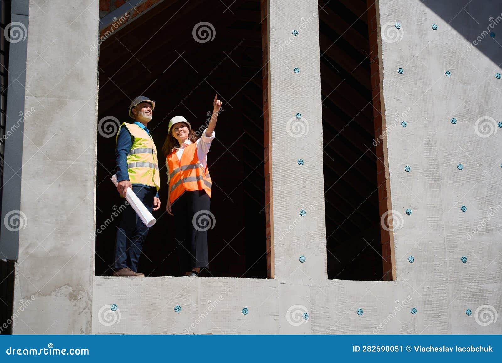 Building Engineers Standing Inside almost Builded House Stock Image ...