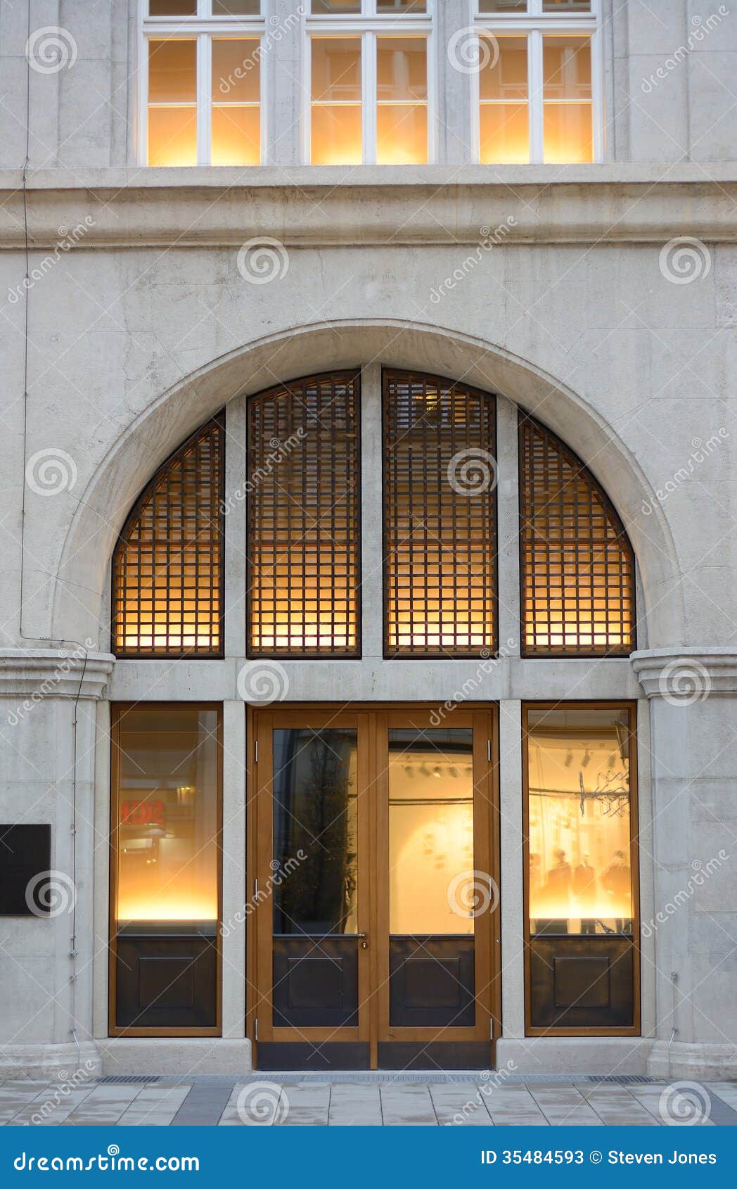 Building Entrance with Warm Light Stock Image - Image of enter ...