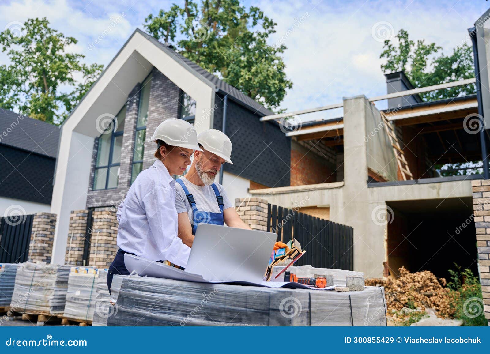 Building Experts Choosing Paint Colors for House Exterior Stock Image ...