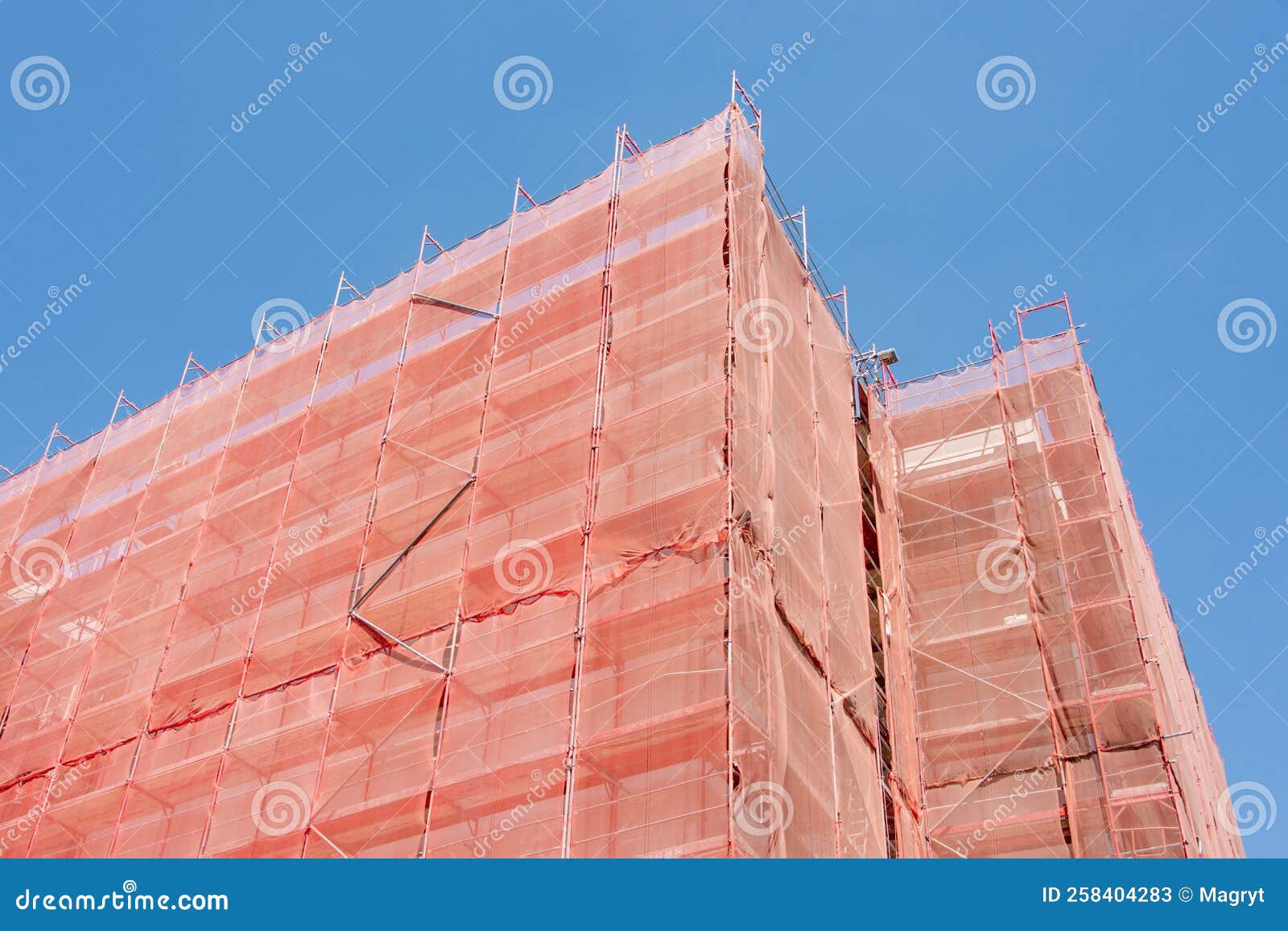 Building Facade Corner Under Construction is Covered with a Protective ...