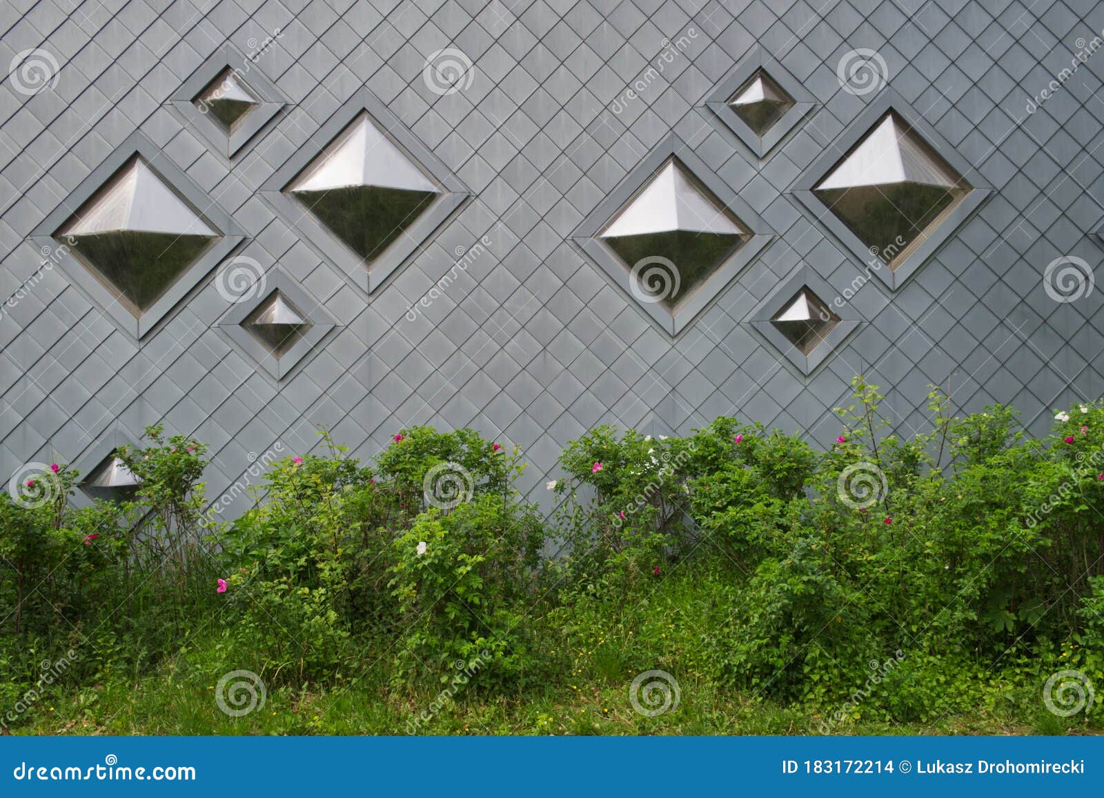 Building Facade with Diamond-shaped Windows. Stock Photo - Image of ...