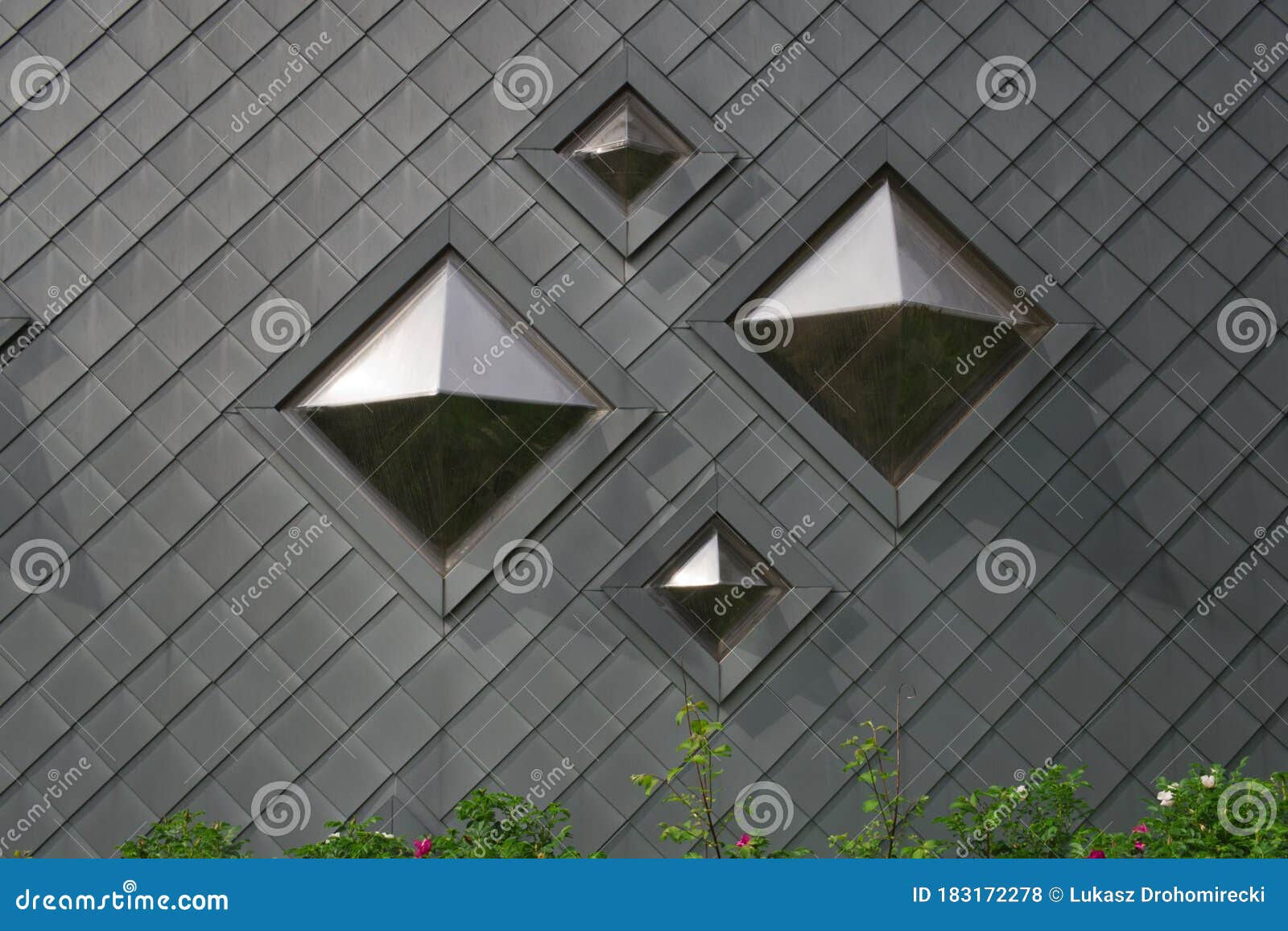 Building Facade with Diamond-shaped Windows. Stock Photo - Image of ...