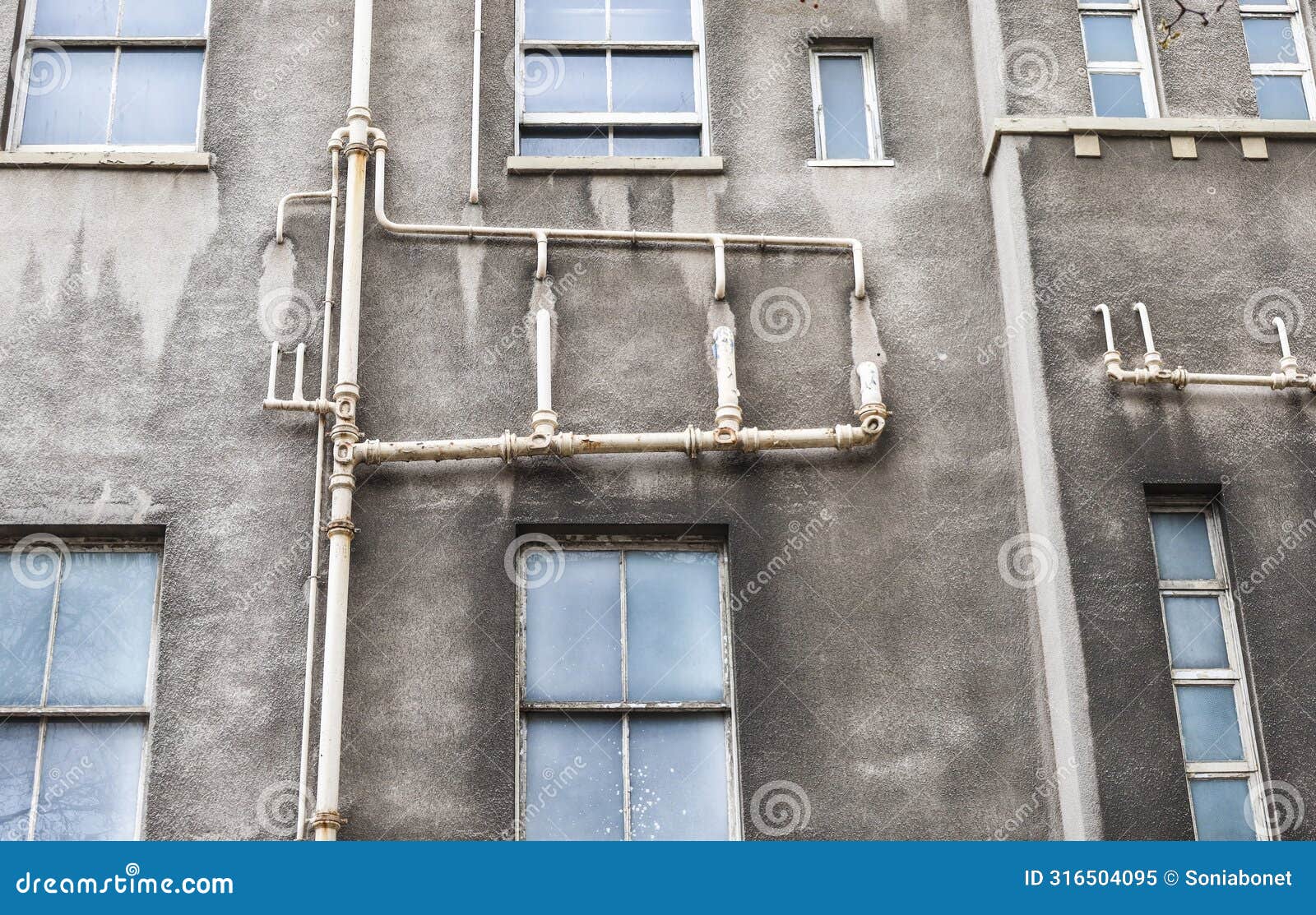 Building Facade with External Pipes Stock Image - Image of exterior ...