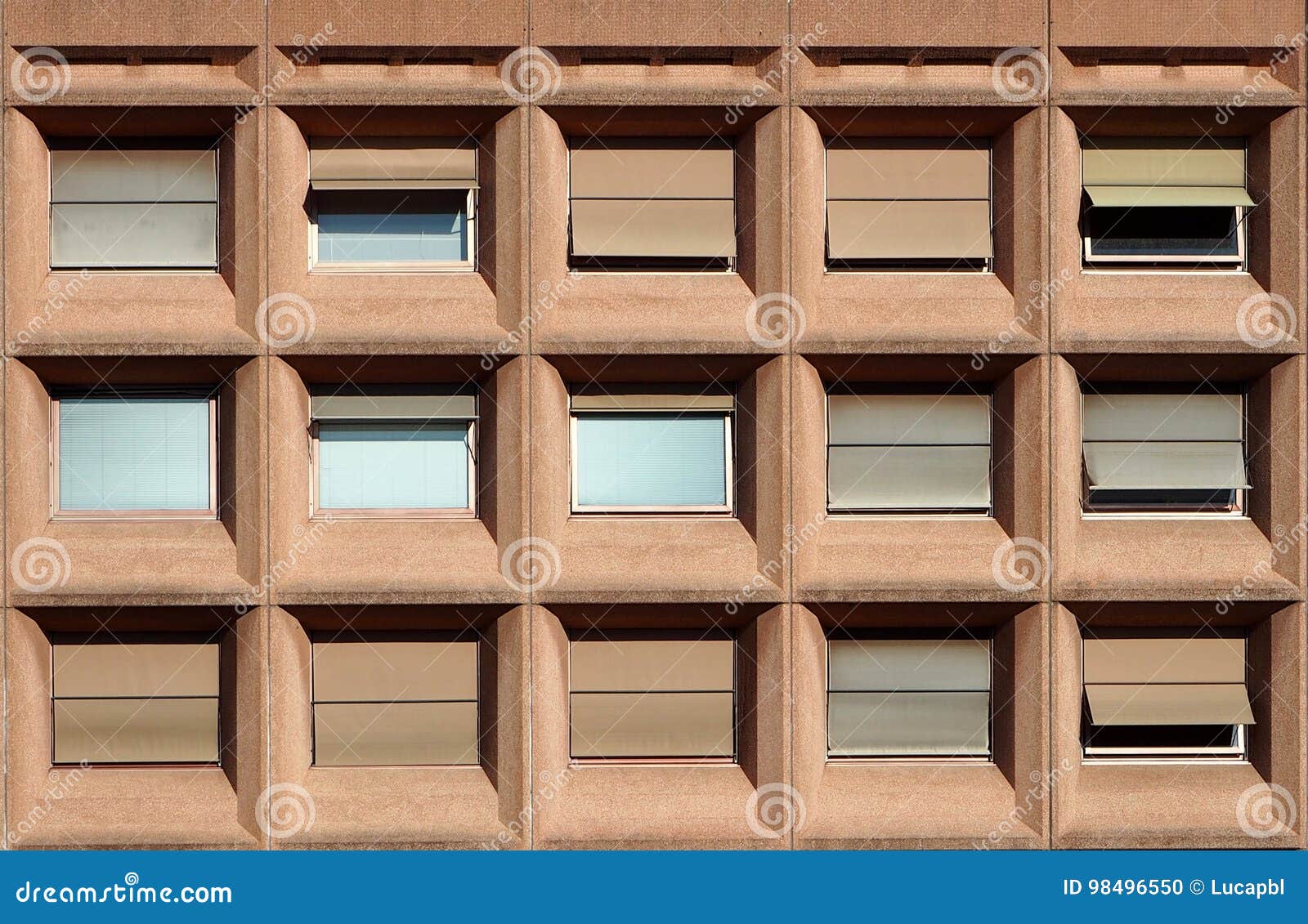 Building Facade Made of Pink Granite with Large Square Windows, Stock ...