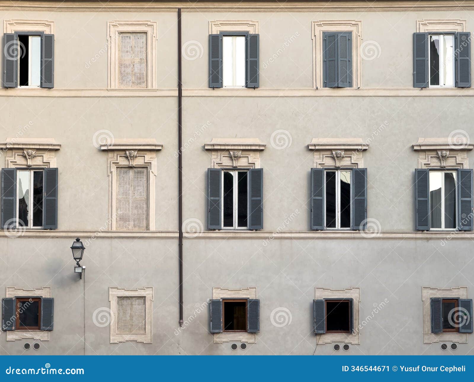A Building Facade with Shuttered Windows Stock Image - Image of texture ...