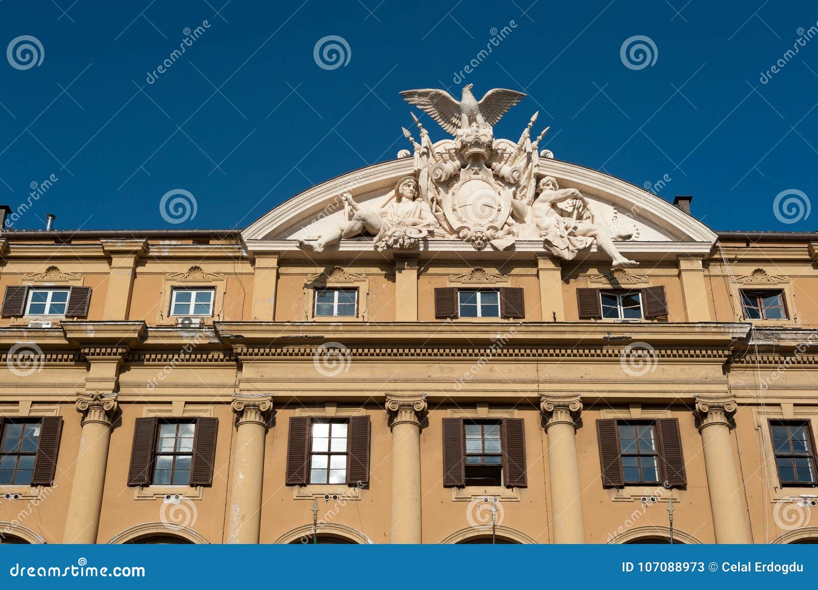 Building Facade with Statue from Marble Stone on Top of Building Rome ...