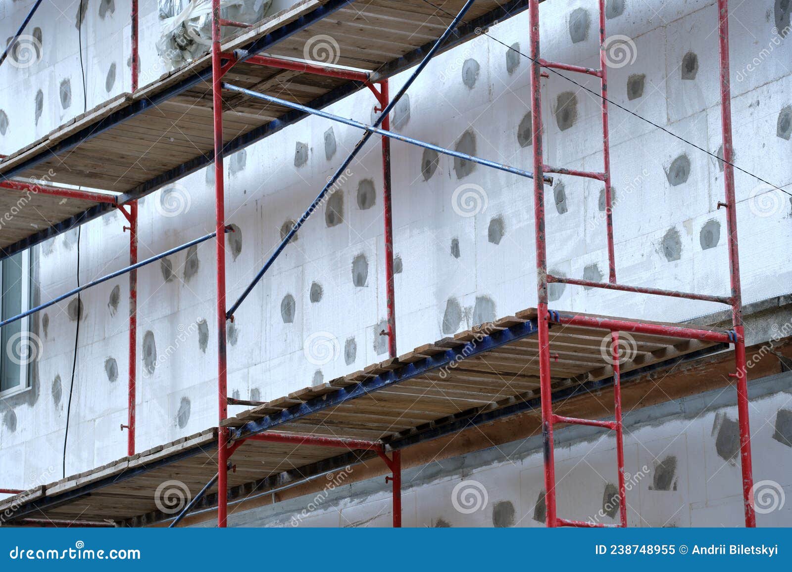 Building Facade Under Renovation Works with Construction Scaffolding ...