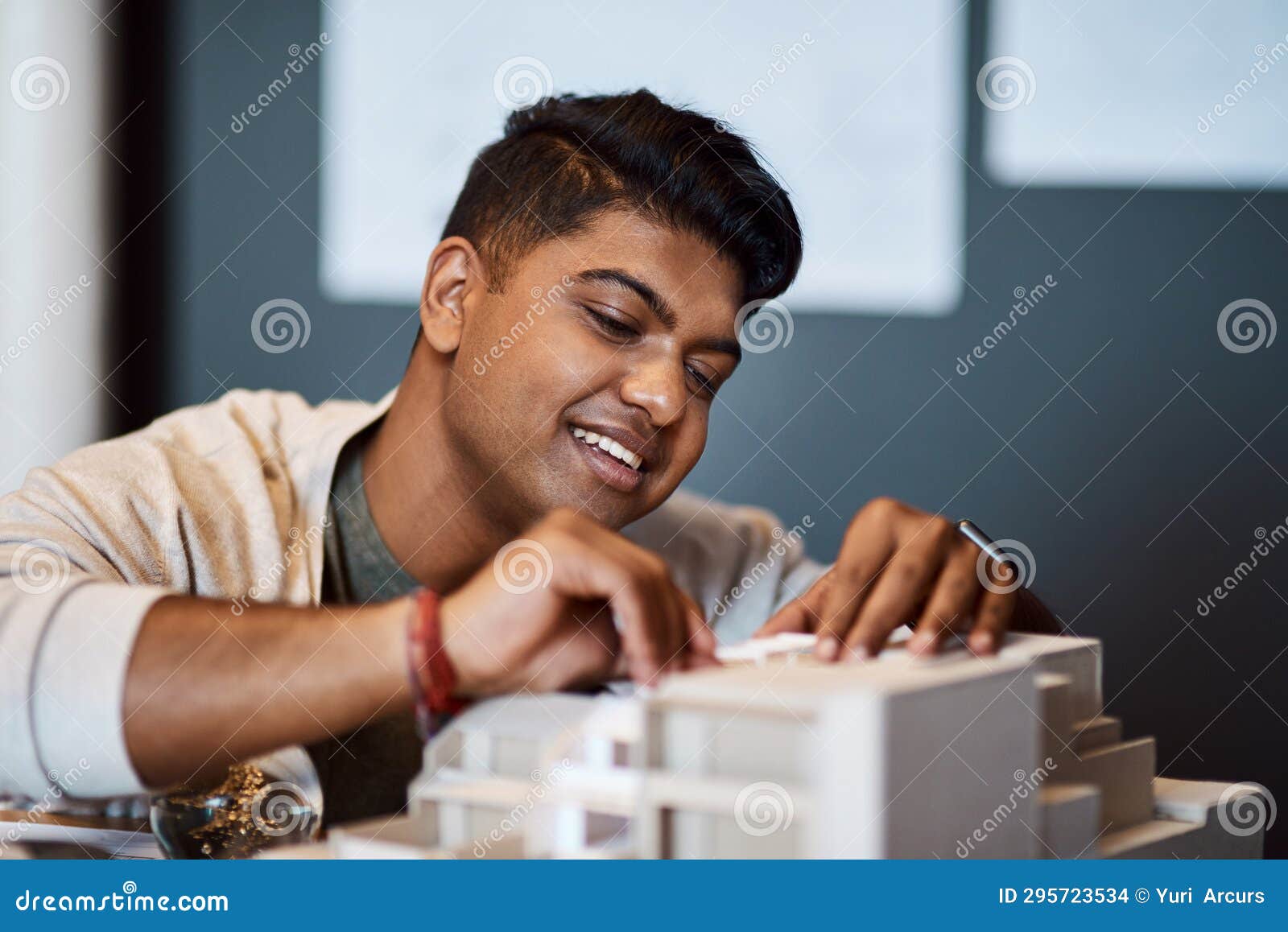 Building a Firm Foundation for Success. a Young Architect Designing a ... Building a Firm Foundation for Success. a Young Architect Designing a ...
