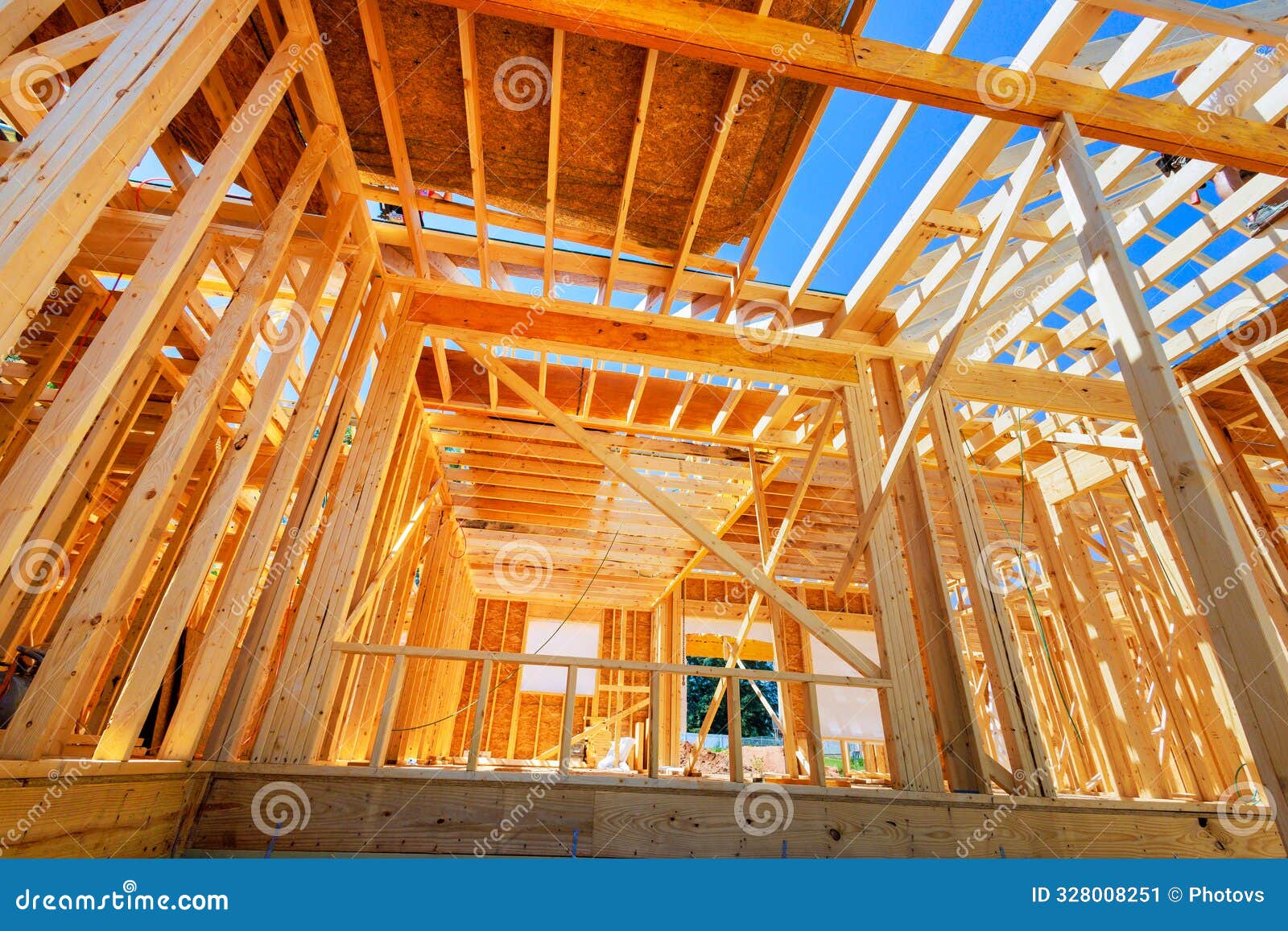 Building Framework for New Home with Wooden Truss, Beams, Posts As Part ...