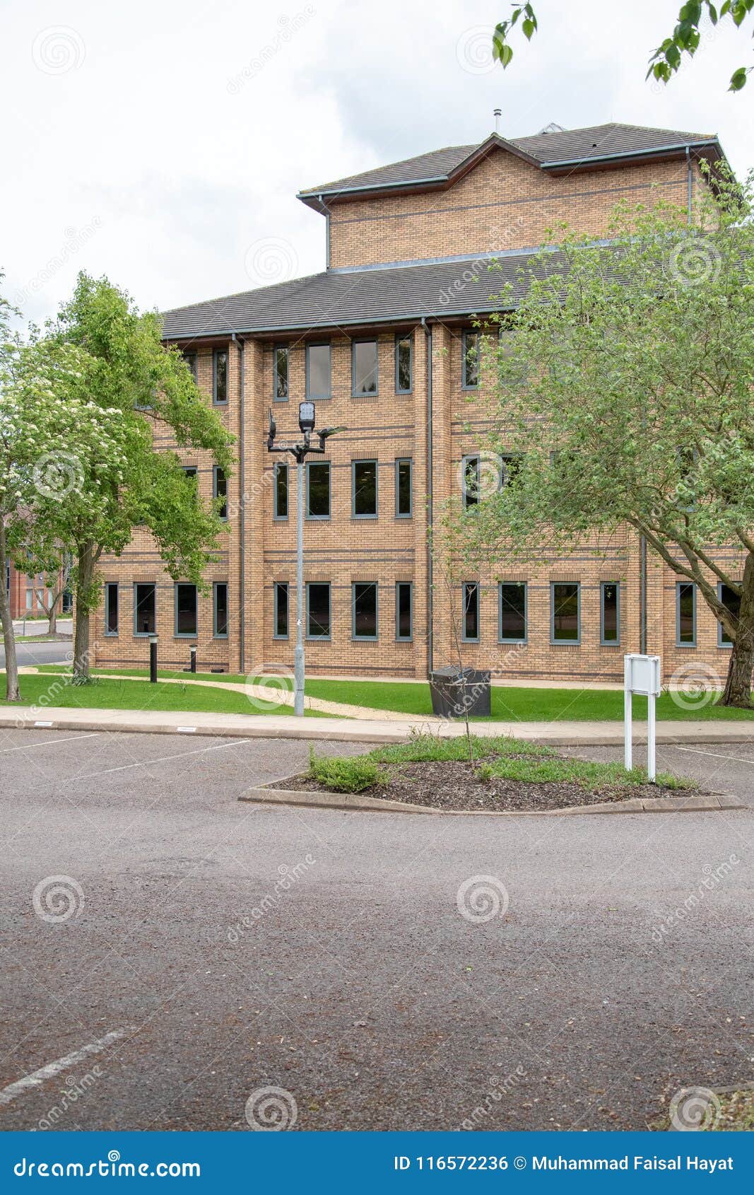 Building Front and Car Park Spaces Stock Photo - Image of trees, spaces ...