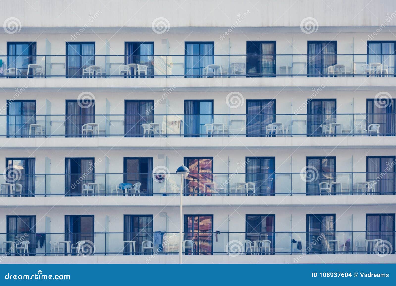 Modern Building Front Wall with Repeating Pattern of Windows and ...