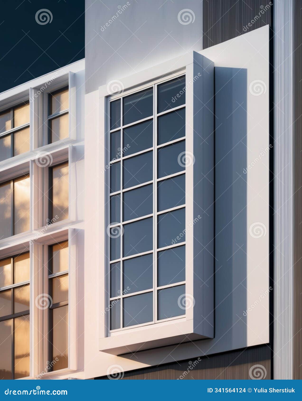 The Building Has Many Windows and a Large Window in the Middle. Stock ...