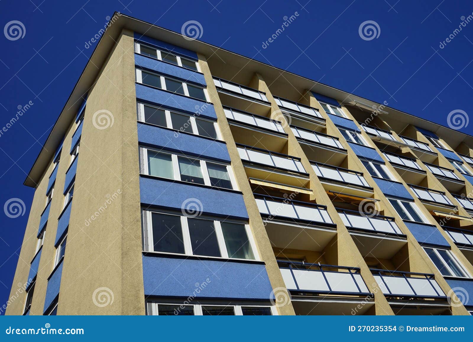 A Building that Has Some Windows and is Tall and Colorful Stock ...