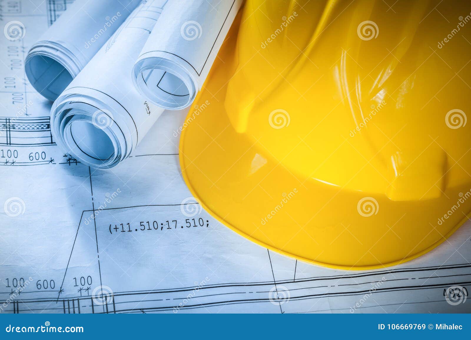 Building Helmet Construction Plans on Blueprint Stock Image - Image of ...