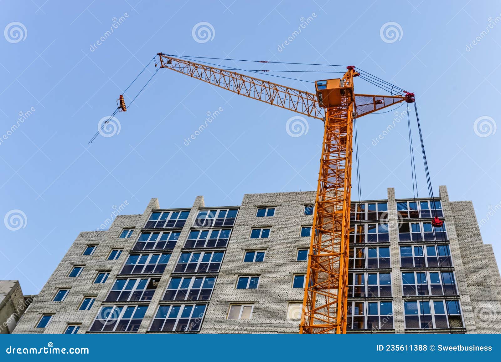 Building High-rise crane stock photo. Image of urban - 235611388