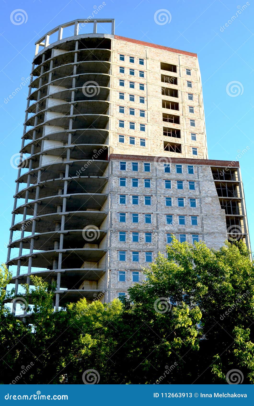 Building High-rise Building Made of Concrete Against the Blue Sky Stock ...