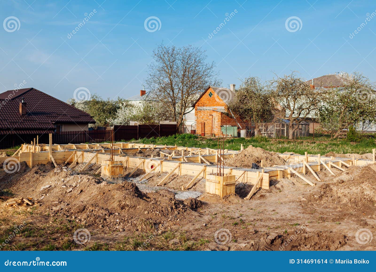 Building House. Concrete Foundation Surrounded with Wooden Decking is ...