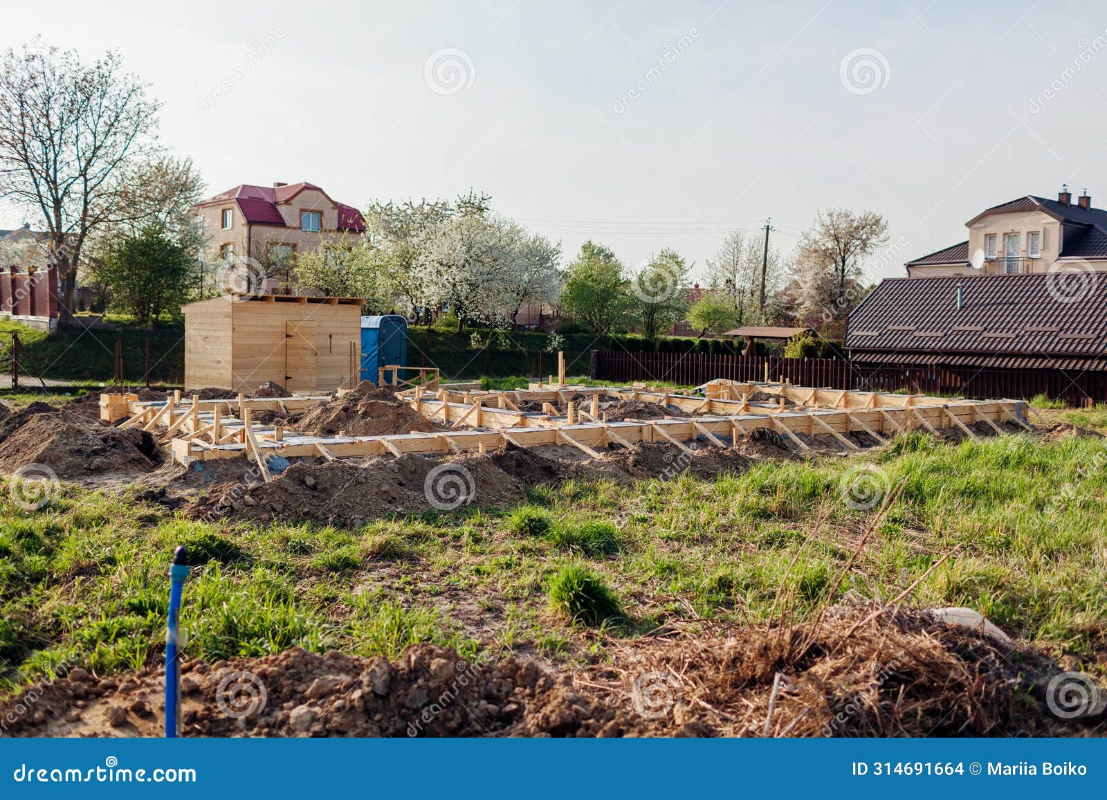 Building House. Concrete Foundation Surrounded with Wooden Decking is ...