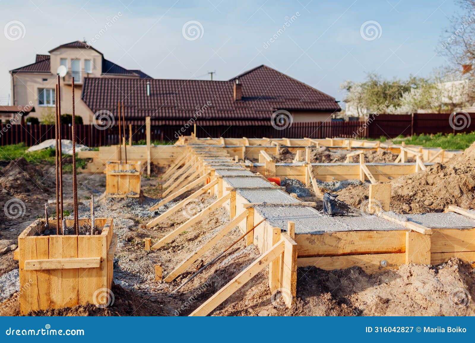 Building House. Concrete Foundation Surrounded with Wooden Decking is ...