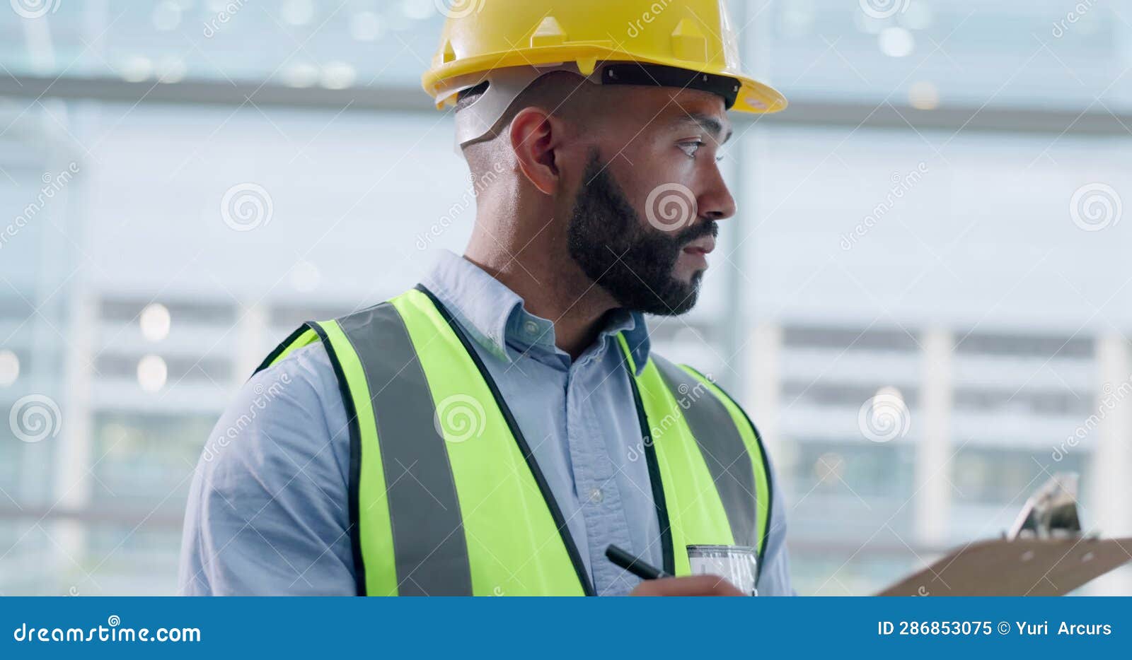 Building Inspection, Planning and a Construction Worker with Notes for ...