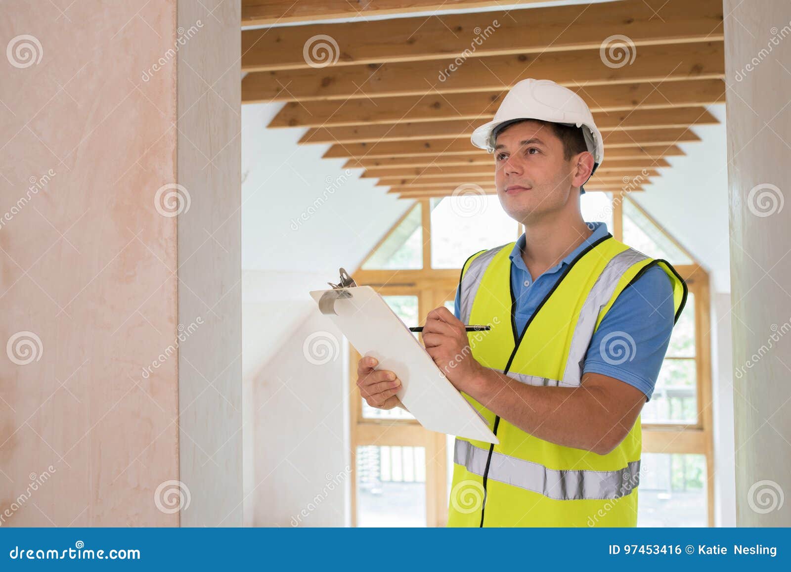Building Inspector Looking at New Property Stock Photo - Image of ...