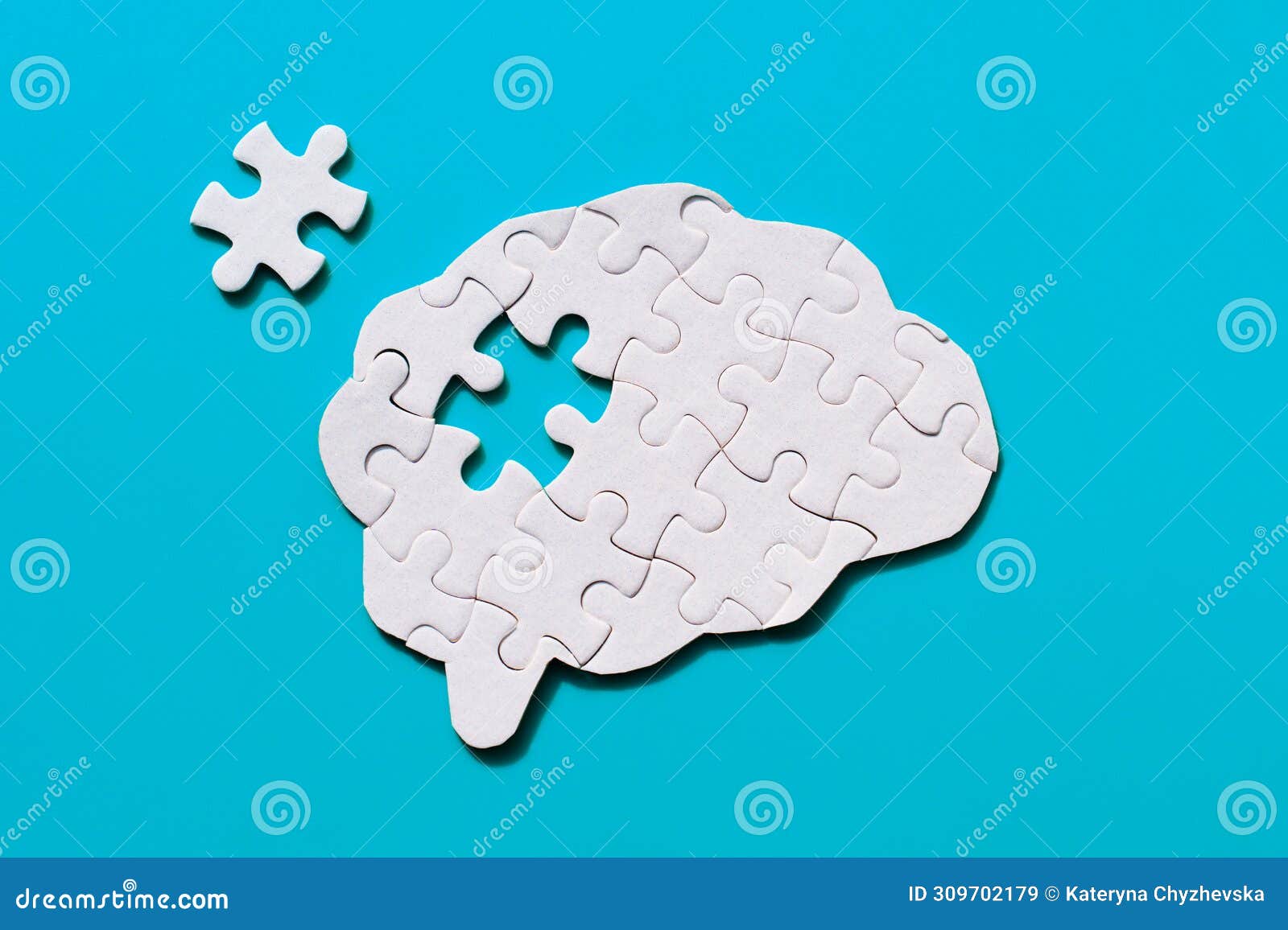 Building Knowledge: Incomplete Brain Puzzle on Blue Stock Image - Image ...