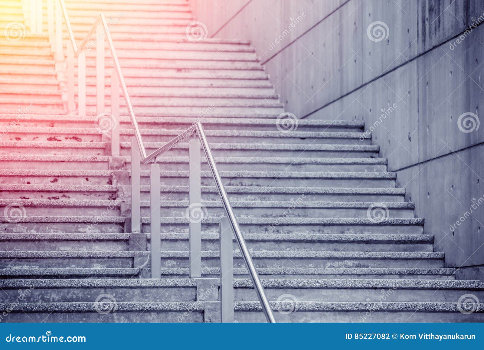 A Man Is Building A Ladder Or Growth Chart From Blocks. Strategy ...