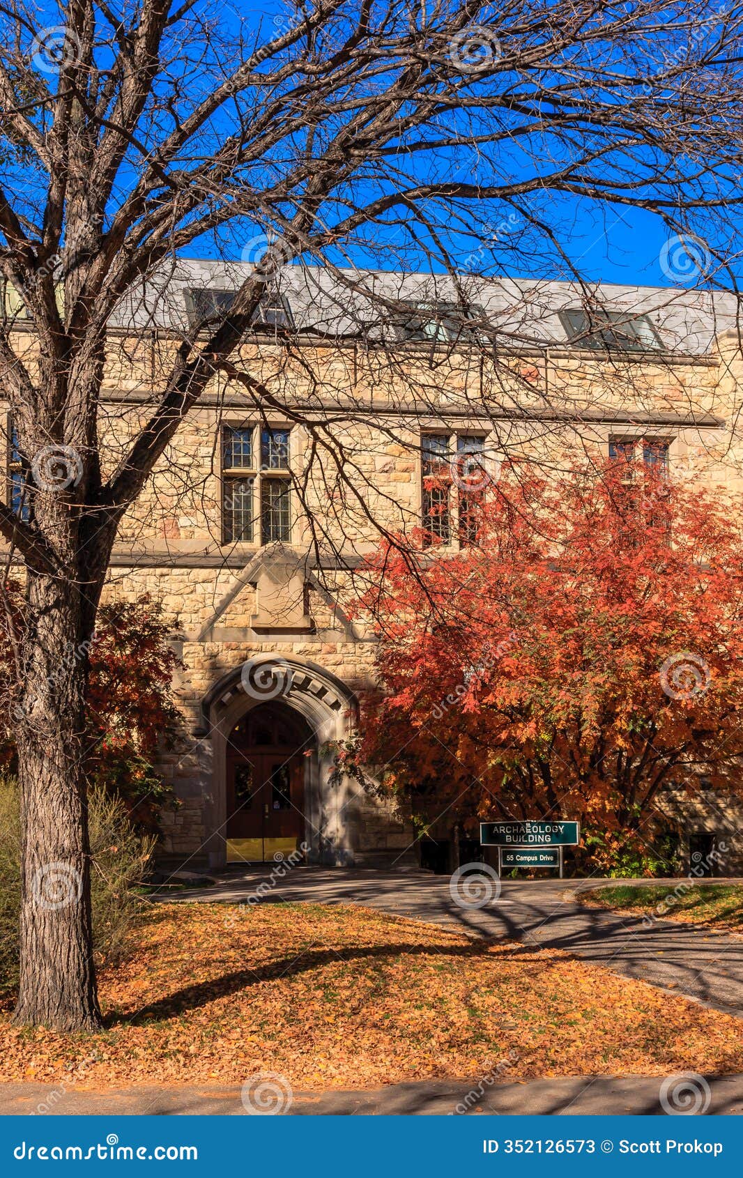 A Building with a Large Archway and a Sign on the Front Stock Image ...