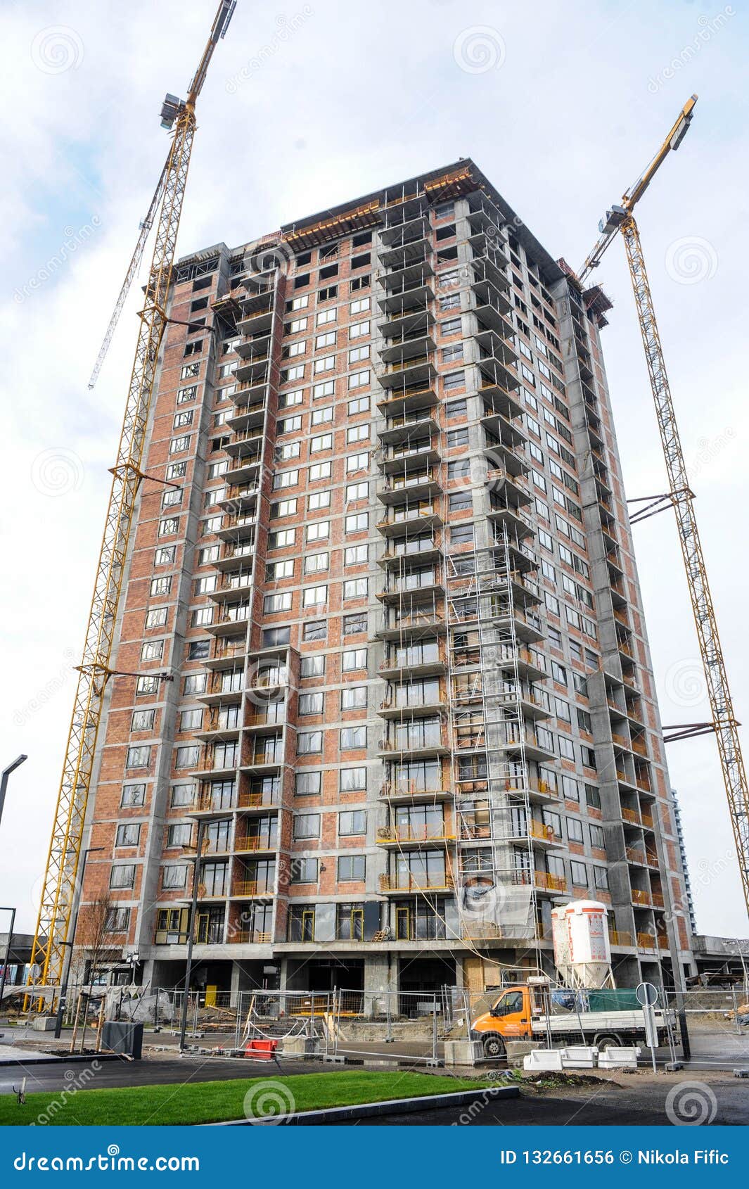 Cranes on Construction Yard Stock Photo - Image of complex, heavy ...