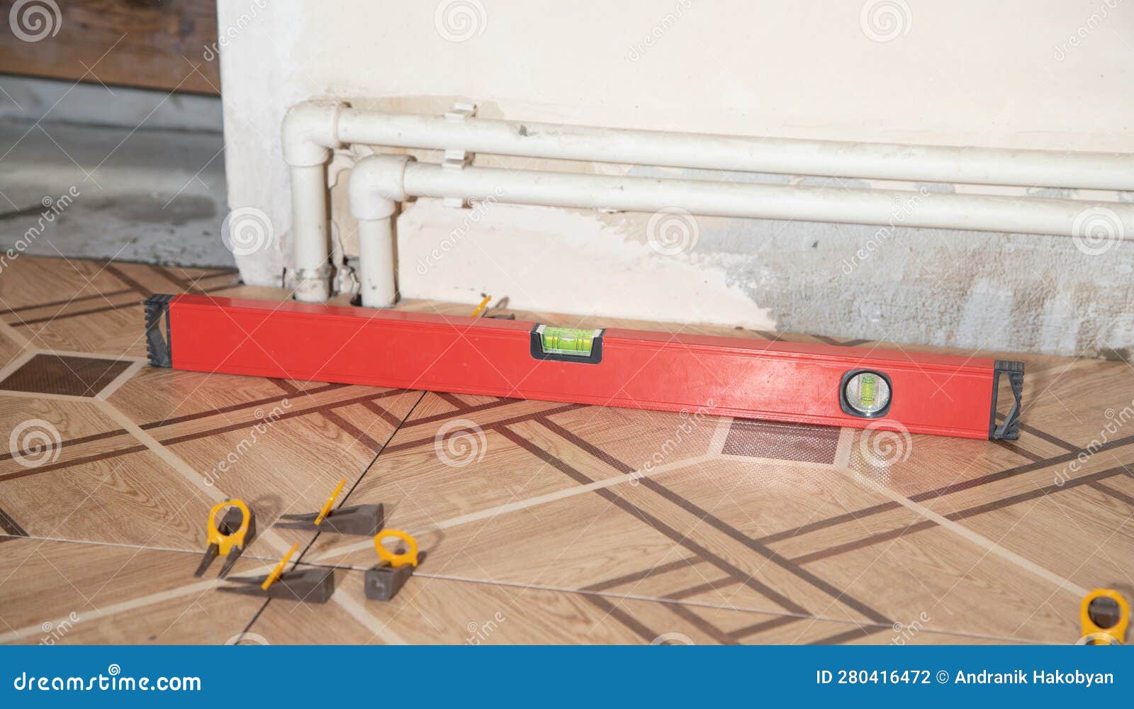 Building Level on the Floor. Renovating the Floor Stock Photo - Image ...